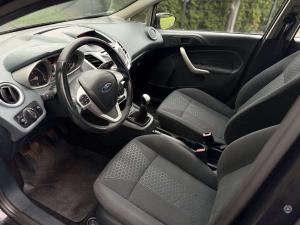 Black Ford Fiesta 2009 in Kaunas, with an engine capacity of 1.56 L and mileage of 294 thousand km for 2100 €, photo 9 on AUTOMOTO.COM.LV
