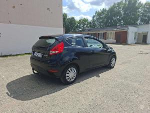 Black Ford Fiesta 2009 in Panevezys, with an engine capacity of 1.24 L and mileage of 223 thousand km for 1400 €, photo 3 on AUTOMOTO.COM.LV