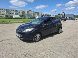 Black Ford Fiesta 2009 in Panevezys, with an engine capacity of 1.24 L and mileage of 223 thousand km for 1400 €, photo 5 on AUTOMOTO.COM.LV