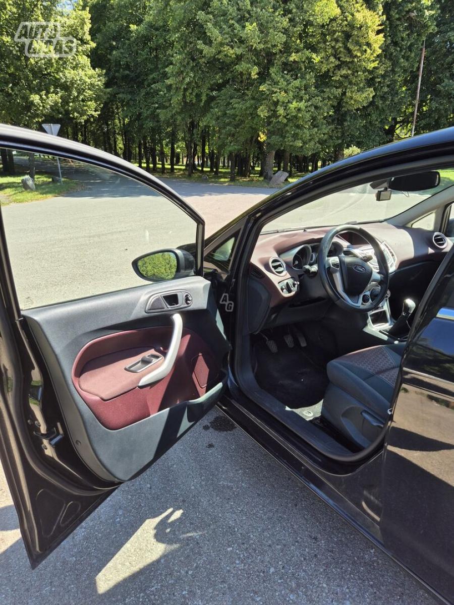 Black Ford Fiesta 2009 in Marijampole, with an engine capacity of 1.20 L and mileage of 112 thousand km for 2999 €, photo 6 on AUTOMOTO.COM.LV