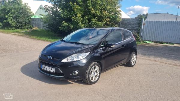 Black Ford Fiesta 2009 in Kaunas, with an engine capacity of 1.40 L and mileage of 165 thousand km for 1750 €, photo 1 on AUTOMOTO.COM.LV