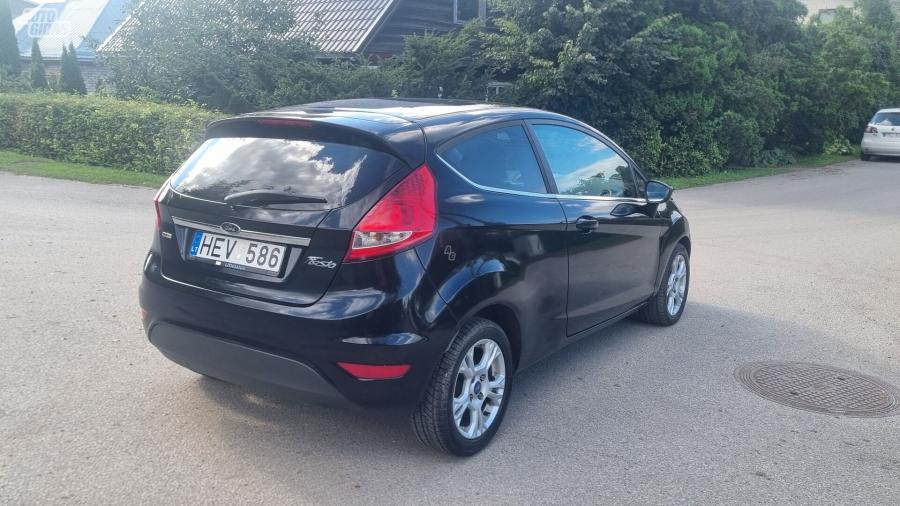 Black Ford Fiesta 2009 in Kaunas, with an engine capacity of 1.40 L and mileage of 165 thousand km for 1750 €, photo 4 on AUTOMOTO.COM.LV