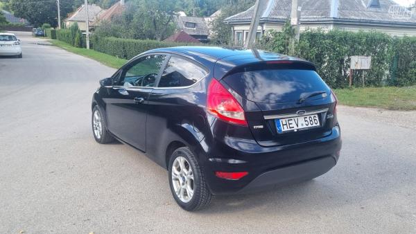Black Ford Fiesta 2009 in Kaunas, with an engine capacity of 1.40 L and mileage of 165 thousand km for 1750 €, photo 5 on AUTOMOTO.COM.LV
