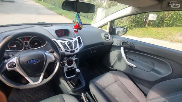 Black Ford Fiesta 2009 in Kaunas, with an engine capacity of 1.40 L and mileage of 165 thousand km for 1750 €, photo 7 on AUTOMOTO.COM.LV