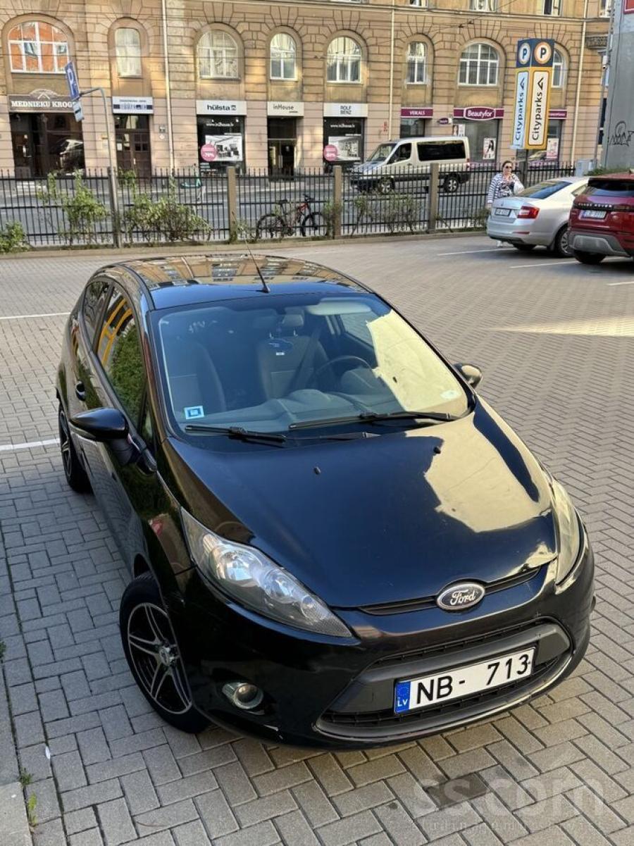 Black Ford Fiesta 2010 in Riga, with an engine capacity of 1.40 L and mileage of 310 thousand km for 1680 €, photo 4 on AUTOMOTO.COM.LV