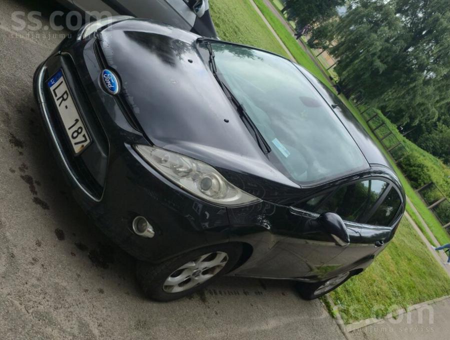 Melns Ford Fiesta 2010 Rīga, ar dzinēja tilpumu 1.60 L un nobraukumu 245 tūkst. km par 2500 €, foto 5 vietnē AUTOMOTO.COM.LV