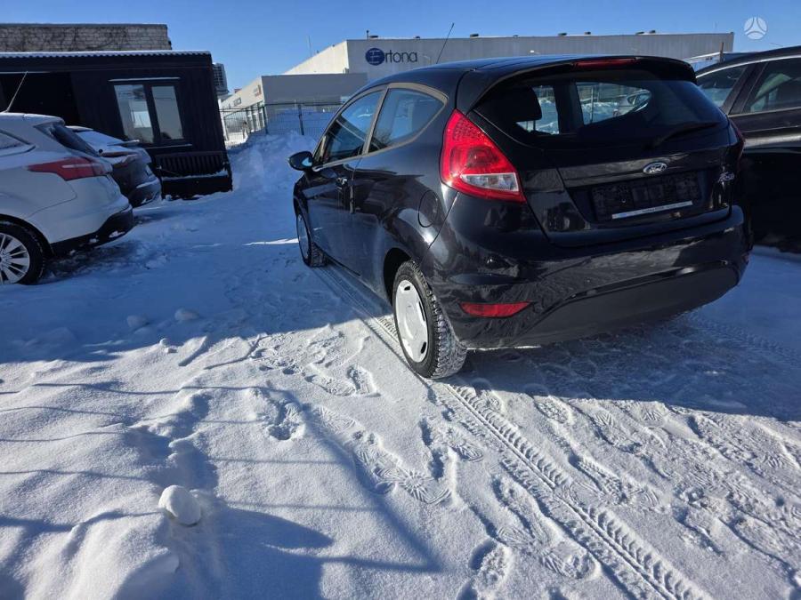 Black Ford Fiesta 2011 in Siauliai, with an engine capacity of 1.24 L and mileage of 161 thousand km for 2500 €, photo 3 on AUTOMOTO.COM.LV
