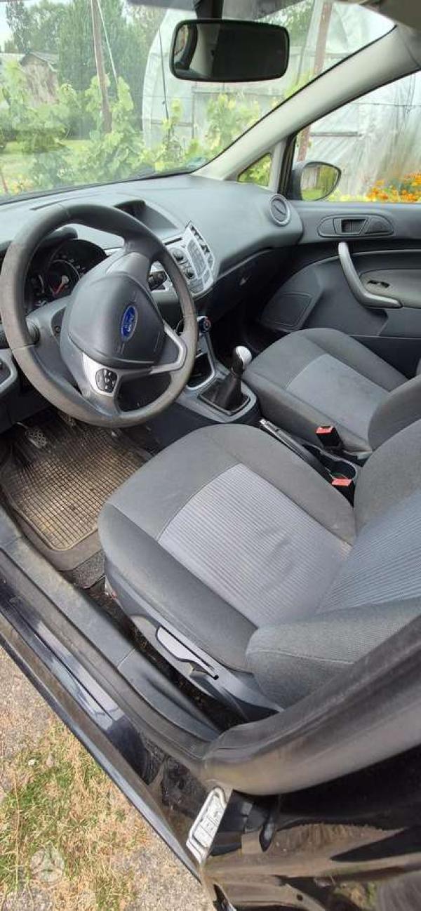 Black Ford Fiesta 2011 in Siauliai, with an engine capacity of 1.56 L and mileage of 15 thousand km for 2300 €, photo 9 on AUTOMOTO.COM.LV