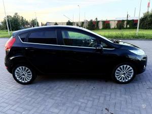 Black Ford Fiesta 2011 in Siauliai, with an engine capacity of 1.56 L and mileage of 295 thousand km for 2150 €, photo 5 on AUTOMOTO.COM.LV