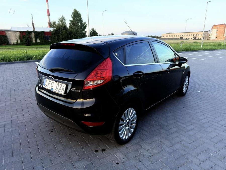 Black Ford Fiesta 2011 in Siauliai, with an engine capacity of 1.56 L and mileage of 295 thousand km for 2150 €, photo 6 on AUTOMOTO.COM.LV