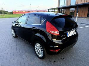 Black Ford Fiesta 2011 in Siauliai, with an engine capacity of 1.56 L and mileage of 295 thousand km for 2150 €, photo 8 on AUTOMOTO.COM.LV