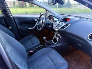 Black Ford Fiesta 2011 in Siauliai, with an engine capacity of 1.56 L and mileage of 295 thousand km for 2150 €, photo 11 on AUTOMOTO.COM.LV