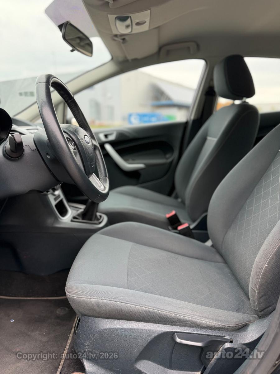 Black Ford Fiesta 2012 in Tallinn, with an engine capacity of 1.60 L and mileage of 189 thousand km for 3900 €, photo 7 on AUTOMOTO.COM.LV