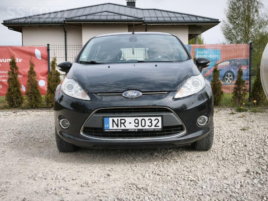 Black Ford Fiesta 2012 in Jelgava, with an engine capacity of 1.40 L and mileage of 0 thousand km for 3290 €, photo 4 on AUTOMOTO.COM.LV