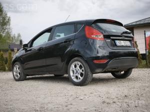 Black Ford Fiesta 2012 in Jelgava, with an engine capacity of 1.40 L and mileage of 0 thousand km for 3290 €, photo 7 on AUTOMOTO.COM.LV