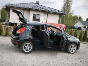 Black Ford Fiesta 2012 in Jelgava, with an engine capacity of 1.40 L and mileage of 0 thousand km for 3290 €, photo 11 on AUTOMOTO.COM.LV