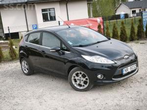 Black Ford Fiesta 2012 in Jelgava, with an engine capacity of 1.40 L and mileage of 0 thousand km for 3290 €, photo 12 on AUTOMOTO.COM.LV