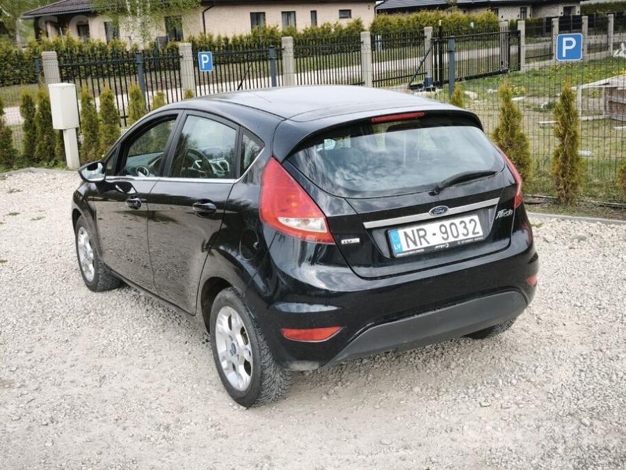 Black Ford Fiesta 2012 in Jelgava, with an engine capacity of 1.40 L and mileage of 0 thousand km for 3290 €, photo 14 on AUTOMOTO.COM.LV