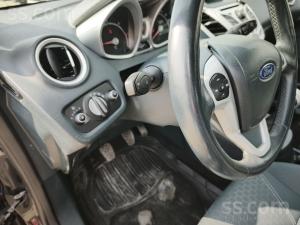 Black Ford Fiesta 2012 in Jelgava, with an engine capacity of 1.40 L and mileage of 0 thousand km for 3290 €, photo 25 on AUTOMOTO.COM.LV