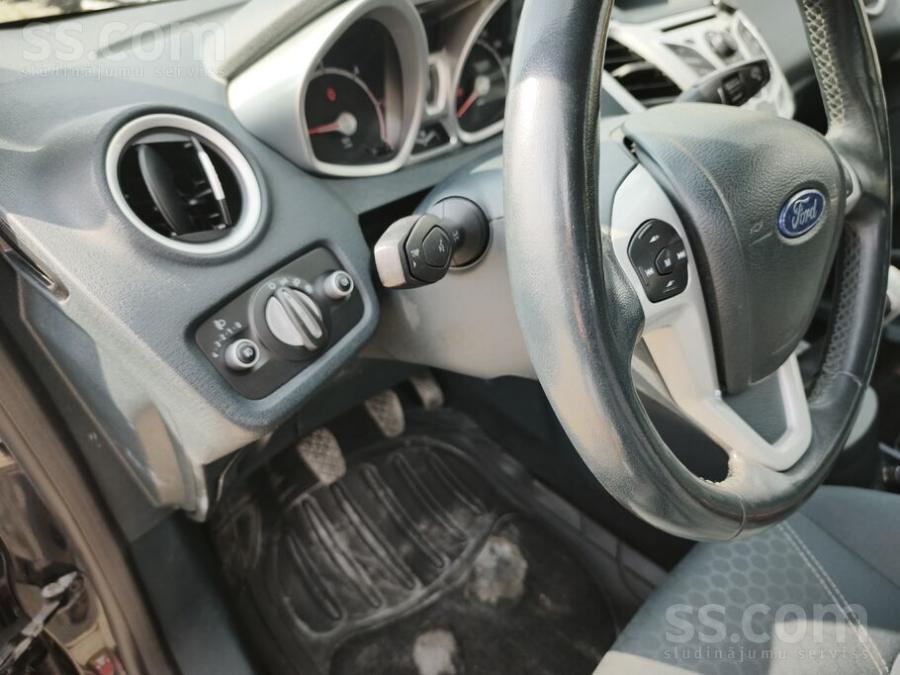 Black Ford Fiesta 2012 in Jelgava, with an engine capacity of 1.40 L and mileage of 0 thousand km for 3290 €, photo 25 on AUTOMOTO.COM.LV