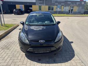 Black Ford Fiesta 2012 in Kaunas, with an engine capacity of 1.24 L and mileage of 175 thousand km for 2950 €, photo 3 on AUTOMOTO.COM.LV