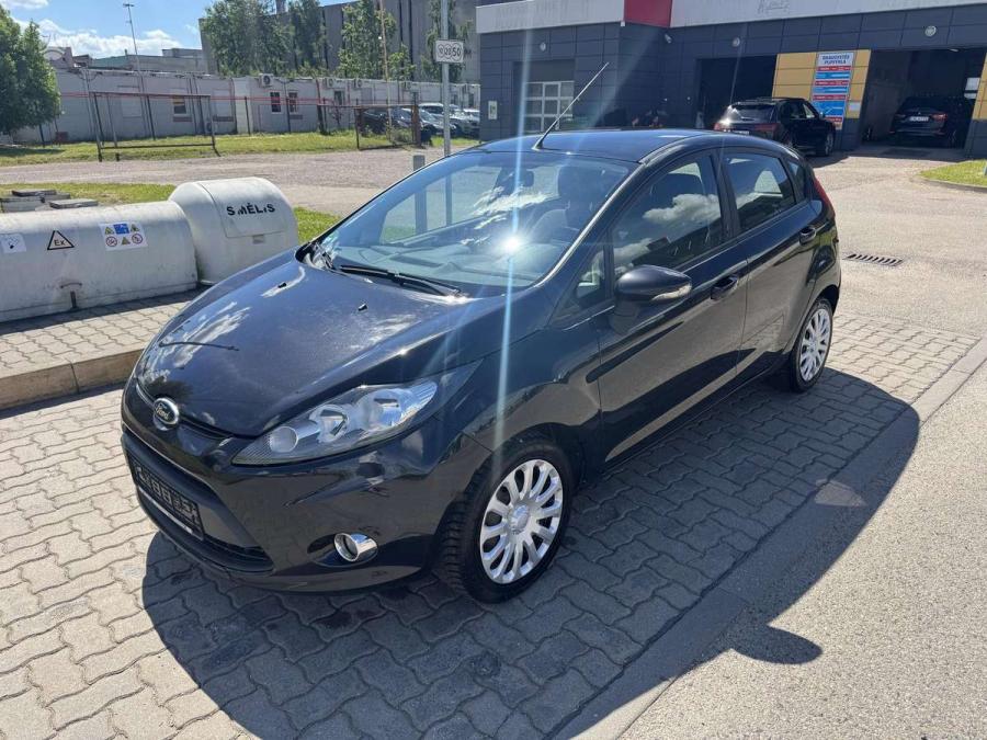 Black Ford Fiesta 2012 in Kaunas, with an engine capacity of 1.24 L and mileage of 175 thousand km for 2950 €, photo 4 on AUTOMOTO.COM.LV