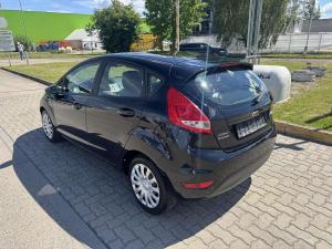 Black Ford Fiesta 2012 in Kaunas, with an engine capacity of 1.24 L and mileage of 175 thousand km for 2950 €, photo 5 on AUTOMOTO.COM.LV