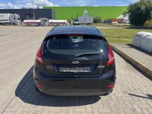 Black Ford Fiesta 2012 in Kaunas, with an engine capacity of 1.24 L and mileage of 175 thousand km for 2950 €, photo 6 on AUTOMOTO.COM.LV