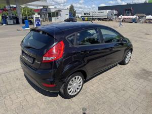 Black Ford Fiesta 2012 in Kaunas, with an engine capacity of 1.24 L and mileage of 175 thousand km for 2950 €, photo 7 on AUTOMOTO.COM.LV