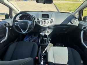 Black Ford Fiesta 2012 in Kaunas, with an engine capacity of 1.24 L and mileage of 175 thousand km for 2950 €, photo 8 on AUTOMOTO.COM.LV