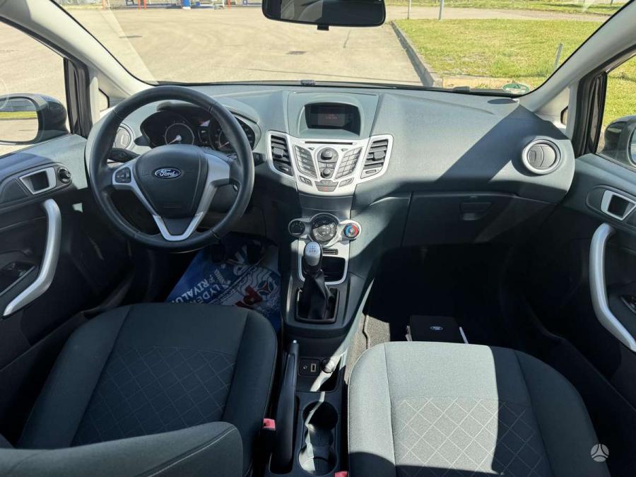 Black Ford Fiesta 2012 in Kaunas, with an engine capacity of 1.24 L and mileage of 175 thousand km for 2950 €, photo 8 on AUTOMOTO.COM.LV