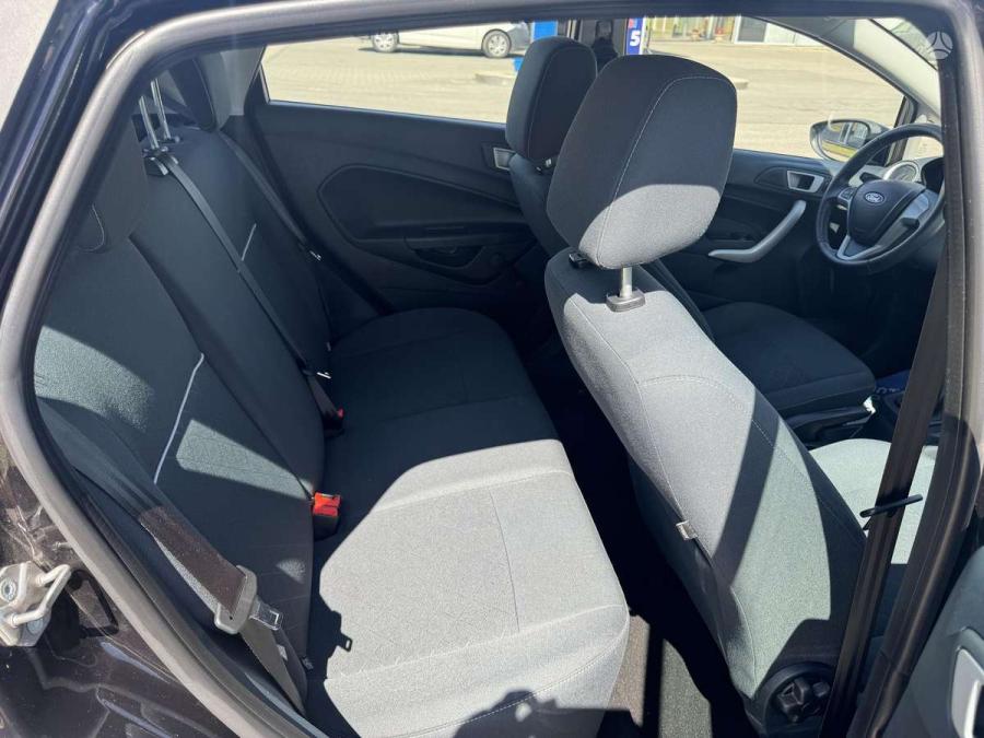 Black Ford Fiesta 2012 in Kaunas, with an engine capacity of 1.24 L and mileage of 175 thousand km for 2950 €, photo 11 on AUTOMOTO.COM.LV