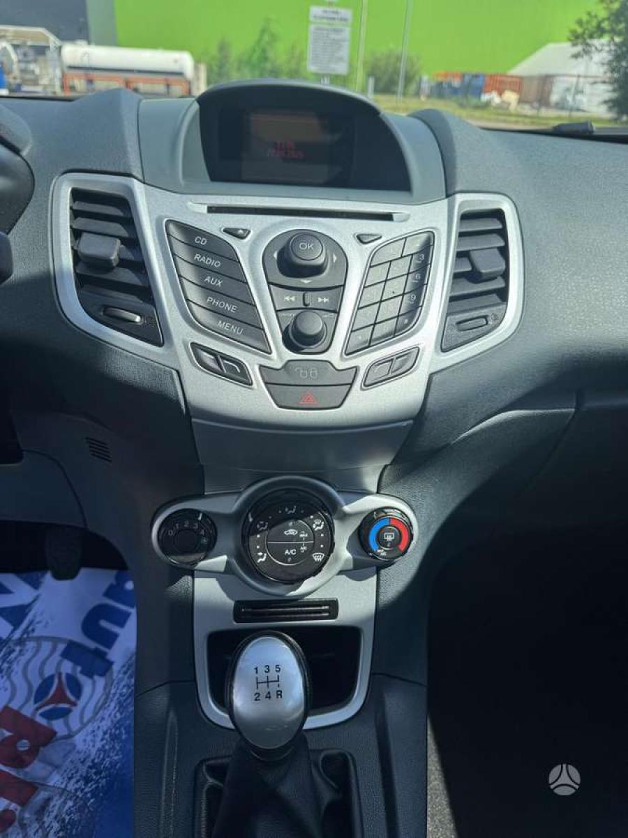Black Ford Fiesta 2012 in Kaunas, with an engine capacity of 1.24 L and mileage of 175 thousand km for 2950 €, photo 12 on AUTOMOTO.COM.LV