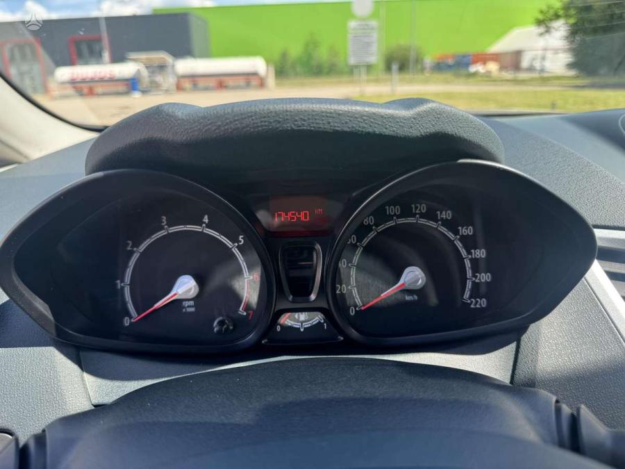 Black Ford Fiesta 2012 in Kaunas, with an engine capacity of 1.24 L and mileage of 175 thousand km for 2950 €, photo 13 on AUTOMOTO.COM.LV