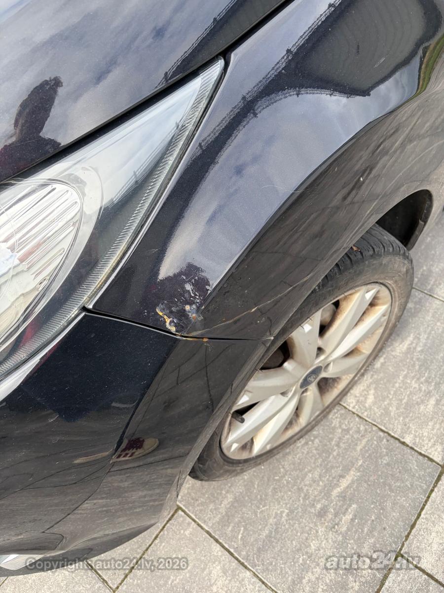 Black Ford Fiesta 2012 in Tallinn, with an engine capacity of 1.60 L and mileage of 208 thousand km for 3200 €, photo 5 on AUTOMOTO.COM.LV