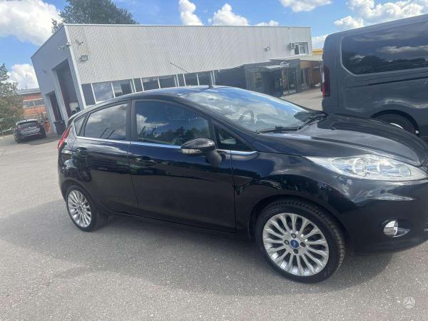 Black Ford Fiesta 2012 in Ukmerge, with an engine capacity of 1.40 L and mileage of 250 thousand km for 2350 €, photo 3 on AUTOMOTO.COM.LV
