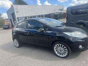 Black Ford Fiesta 2012 in Ukmerge, with an engine capacity of 1.40 L and mileage of 250 thousand km for 2350 €, photo 3 on AUTOMOTO.COM.LV