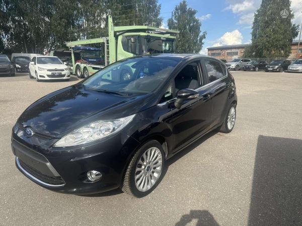 Black Ford Fiesta 2012 in Ukmerge, with an engine capacity of 1.40 L and mileage of 250 thousand km for 2350 €, photo 4 on AUTOMOTO.COM.LV