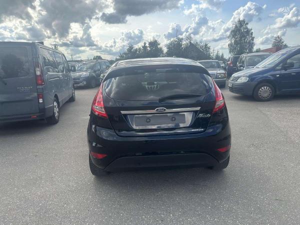 Black Ford Fiesta 2012 in Ukmerge, with an engine capacity of 1.40 L and mileage of 250 thousand km for 2350 €, photo 5 on AUTOMOTO.COM.LV