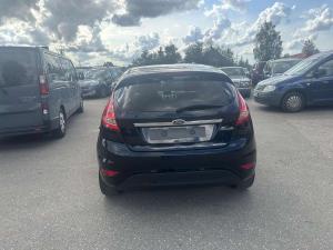 Black Ford Fiesta 2012 in Ukmerge, with an engine capacity of 1.40 L and mileage of 250 thousand km for 2350 €, photo 5 on AUTOMOTO.COM.LV