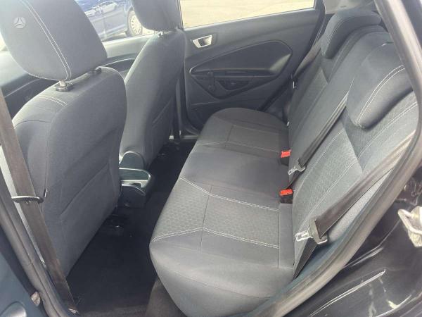 Black Ford Fiesta 2012 in Ukmerge, with an engine capacity of 1.40 L and mileage of 250 thousand km for 2350 €, photo 6 on AUTOMOTO.COM.LV