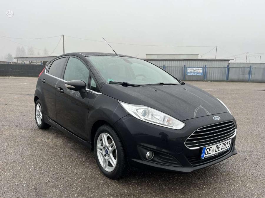 Black Ford Fiesta 2013 in Panevezys, with an engine capacity of 1.24 L and mileage of 187 thousand km for 3800 €, photo 1 on AUTOMOTO.COM.LV
