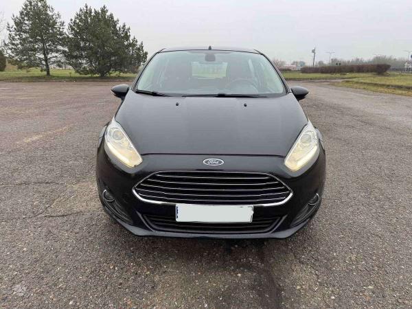 Black Ford Fiesta 2013 in Kaunas, with an engine capacity of 1.00 L and mileage of 140 thousand km for 3499 €, photo 4 on AUTOMOTO.COM.LV