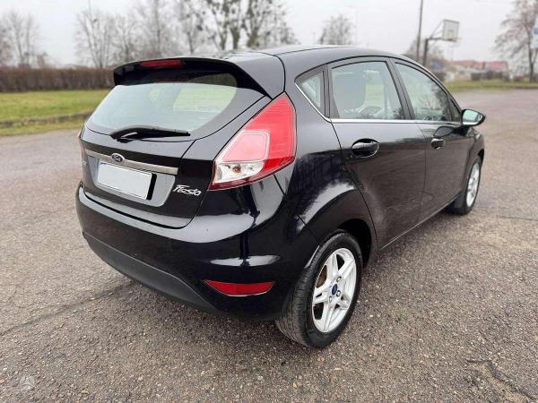 Black Ford Fiesta 2013 in Kaunas, with an engine capacity of 1.00 L and mileage of 140 thousand km for 3499 €, photo 7 on AUTOMOTO.COM.LV