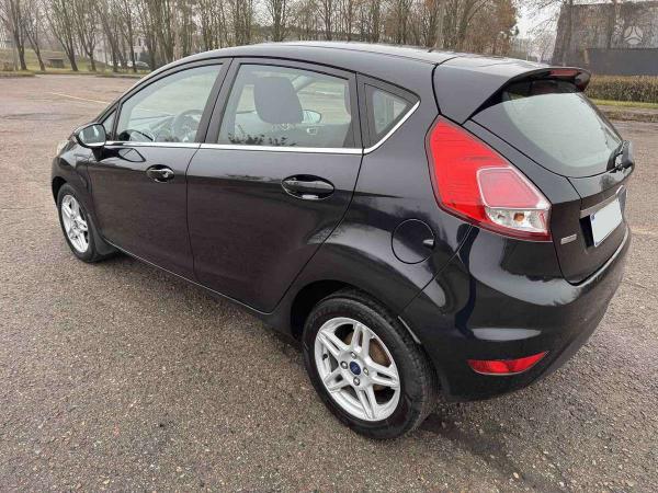 Black Ford Fiesta 2013 in Kaunas, with an engine capacity of 1.00 L and mileage of 140 thousand km for 3499 €, photo 9 on AUTOMOTO.COM.LV