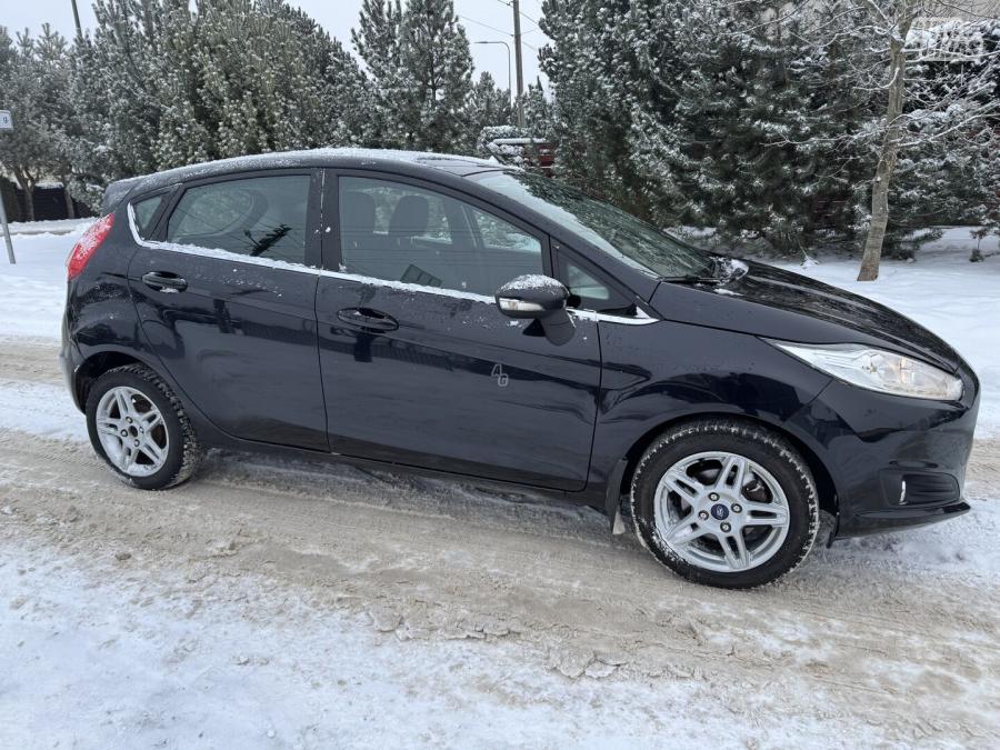 Black Ford Fiesta 2013 in Kaunas, with an engine capacity of 1.00 L and mileage of 140 thousand km for 3499 €, photo 4 on AUTOMOTO.COM.LV