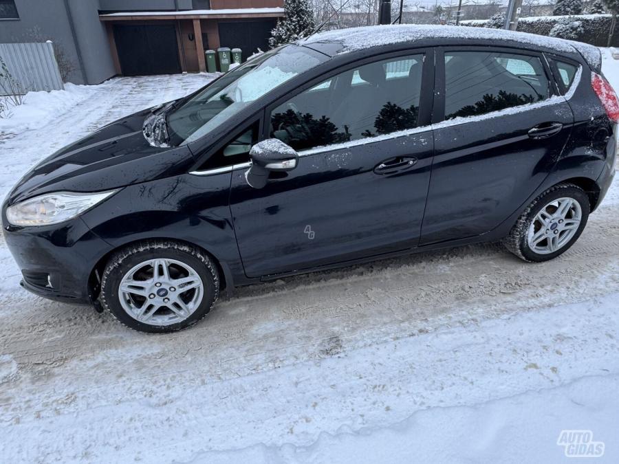 Black Ford Fiesta 2013 in Kaunas, with an engine capacity of 1.00 L and mileage of 140 thousand km for 3499 €, photo 5 on AUTOMOTO.COM.LV