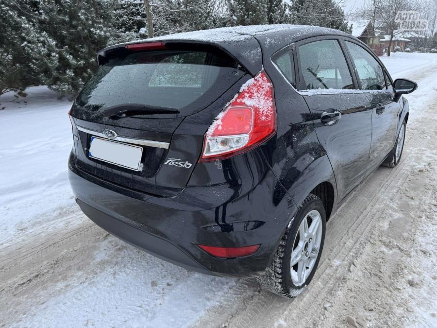 Black Ford Fiesta 2013 in Kaunas, with an engine capacity of 1.00 L and mileage of 140 thousand km for 3499 €, photo 7 on AUTOMOTO.COM.LV