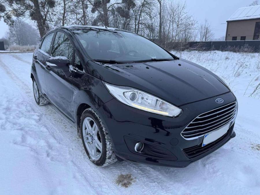 Black Ford Fiesta 2013 in Kaunas, with an engine capacity of 1.00 L and mileage of 140 thousand km for 3450 €, photo 2 on AUTOMOTO.COM.LV