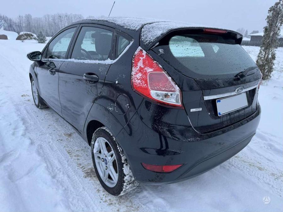 Black Ford Fiesta 2013 in Kaunas, with an engine capacity of 1.00 L and mileage of 140 thousand km for 3450 €, photo 6 on AUTOMOTO.COM.LV